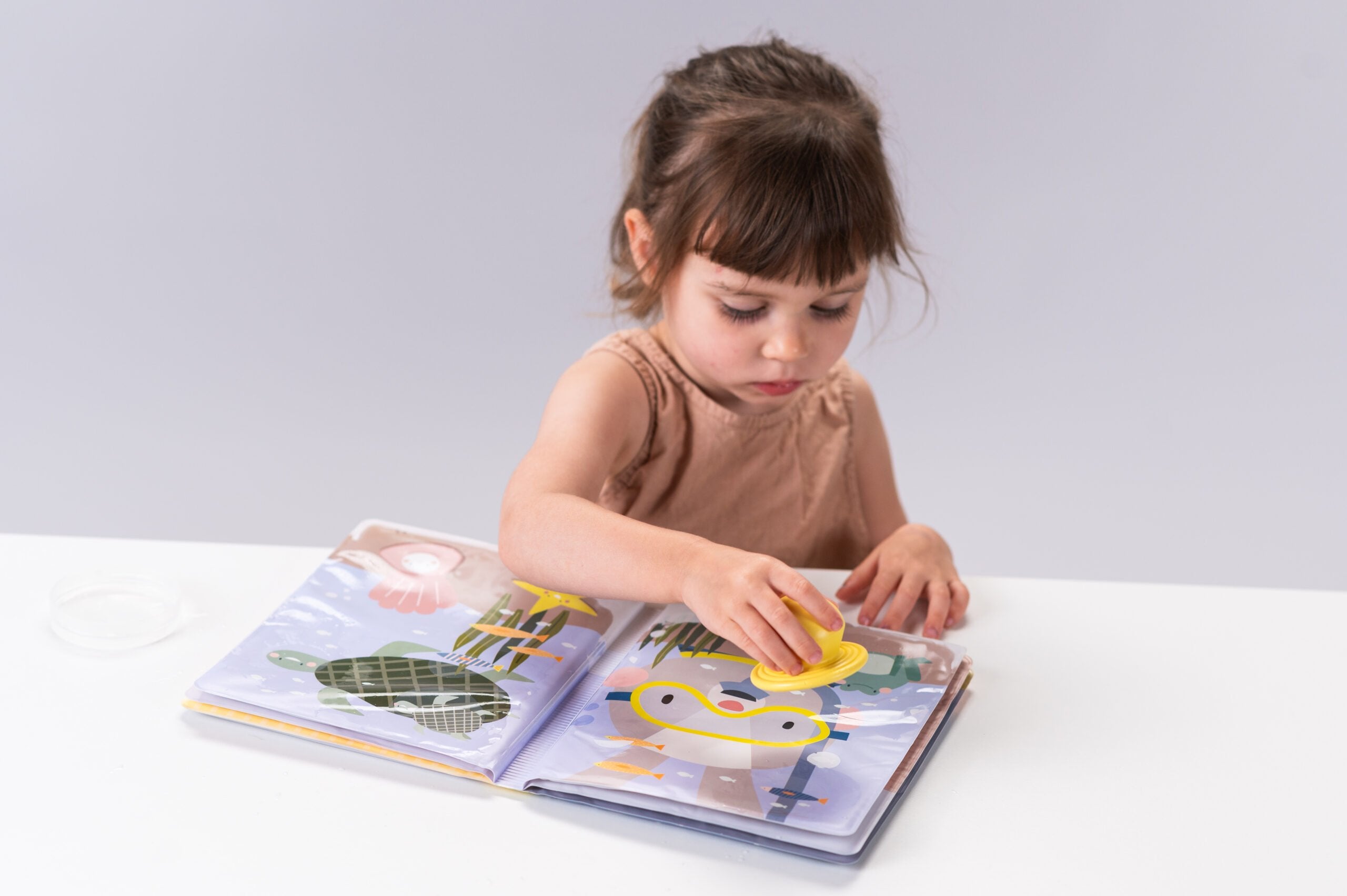 Libro Peek-A-Boo Water TafToys - Baby Steps